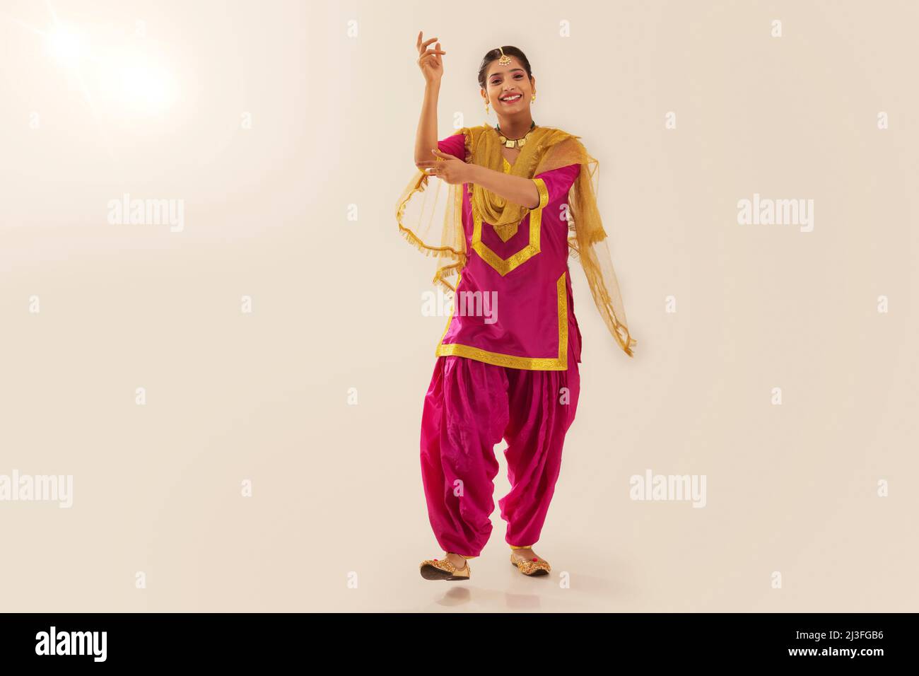 Sikh Woman performing bhangra during Baisakhi Celebration Stock Photo ...