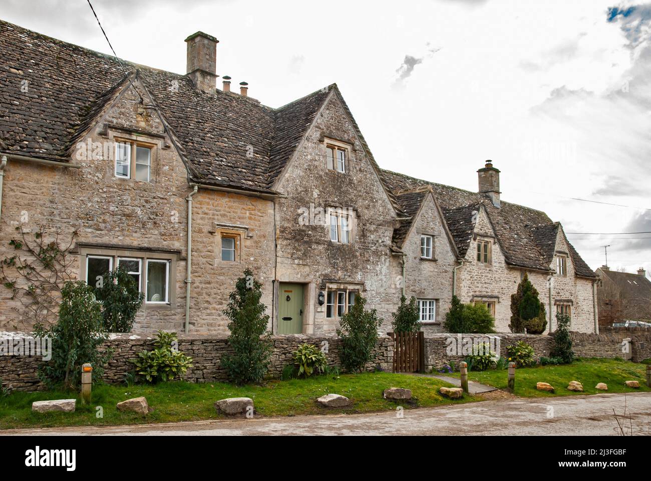 Old traditional romantic stone English country house Stock Photo - Alamy