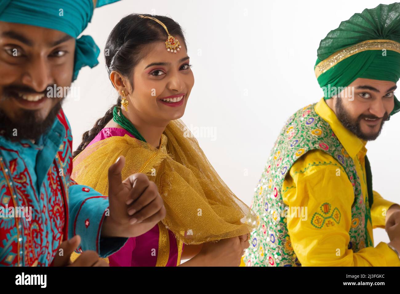 Close-up portrait of happy Sikh people enjoying during Baisakhi ...