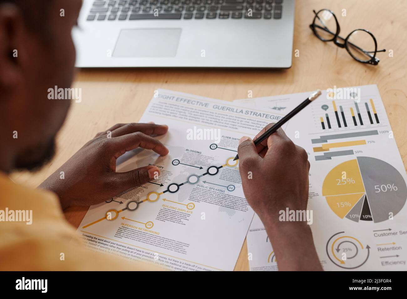 Shoulder hand manager hi-res stock photography and images - Alamy