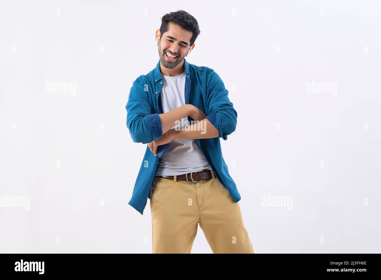 Handsome young man dancing listening hi-res stock photography and ...
