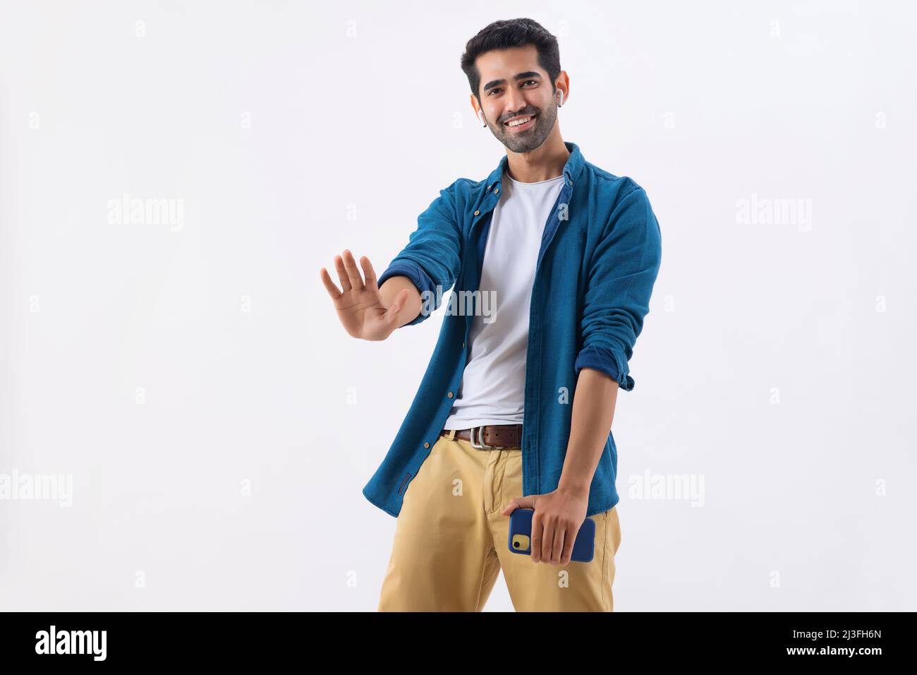 Young man dancing smartphone hi-res stock photography and images - Alamy
