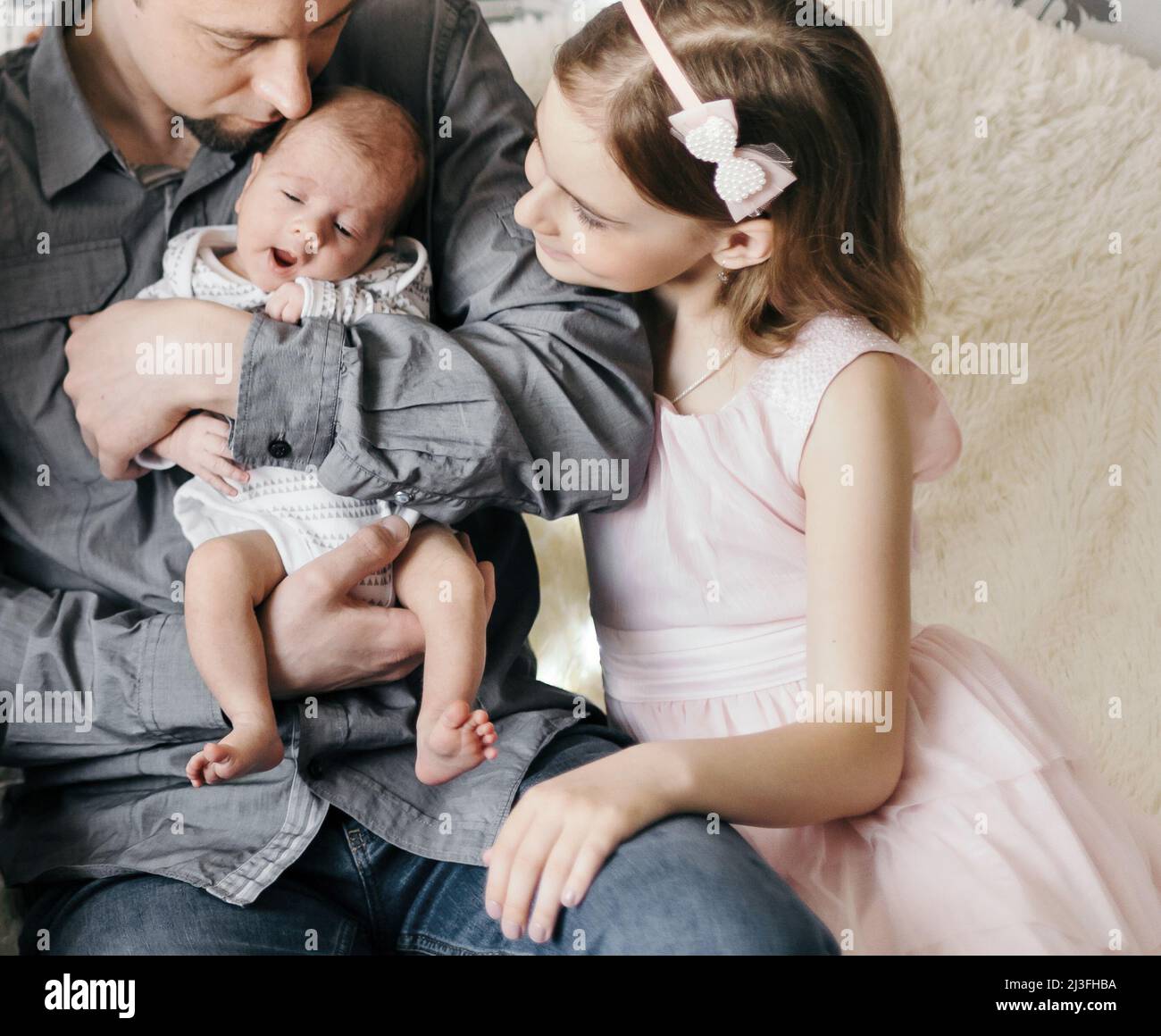 happy married couple with their three children. concept of family ...