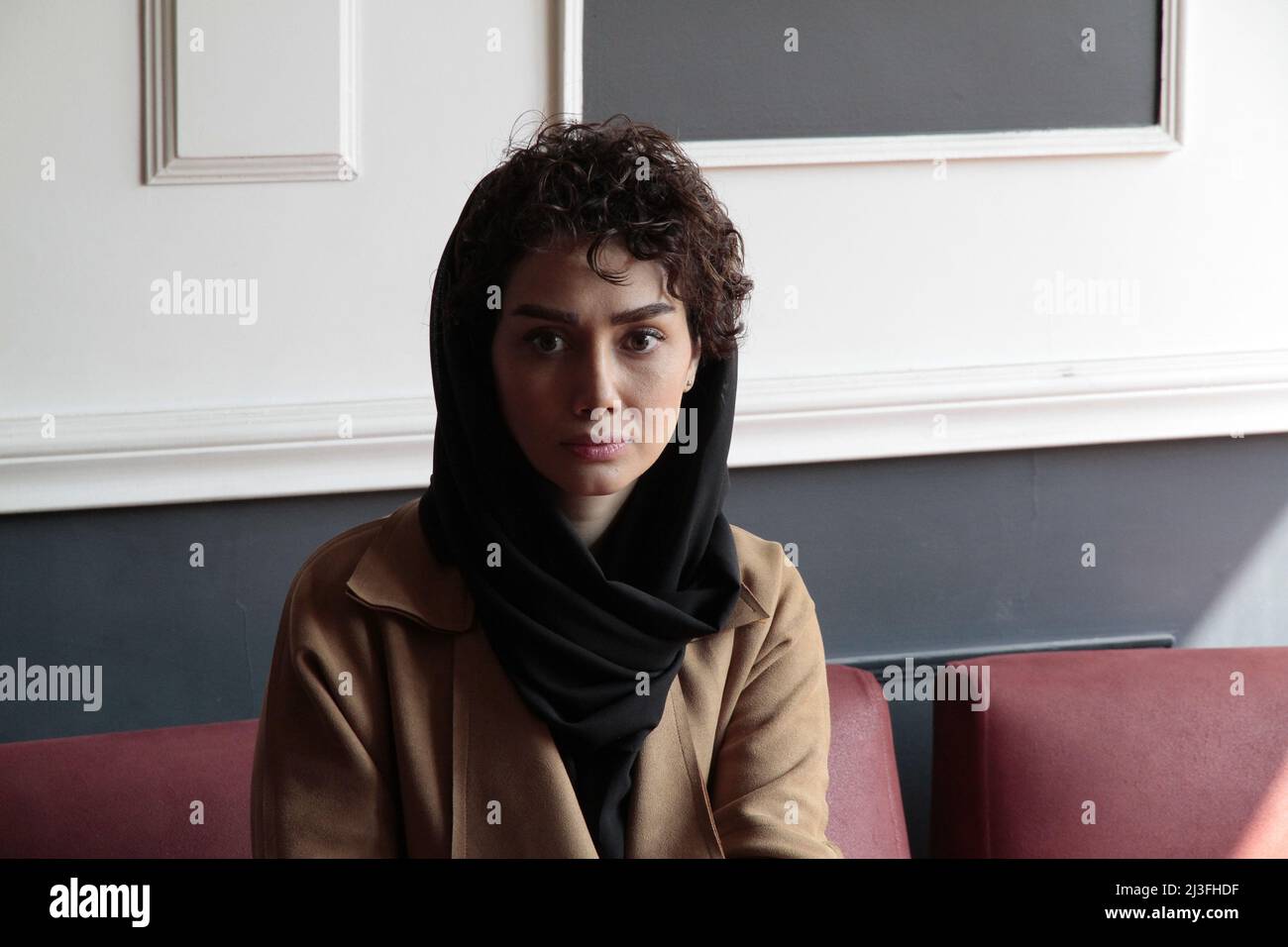Female model in a cafe Stock Photo - Alamy
