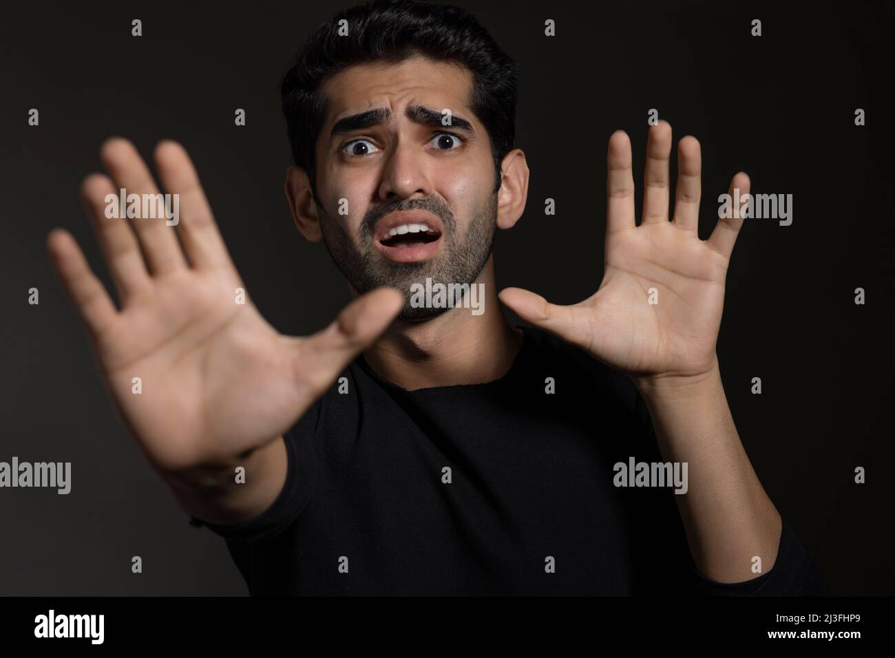 Man frightened crying hi-res stock photography and images - Alamy