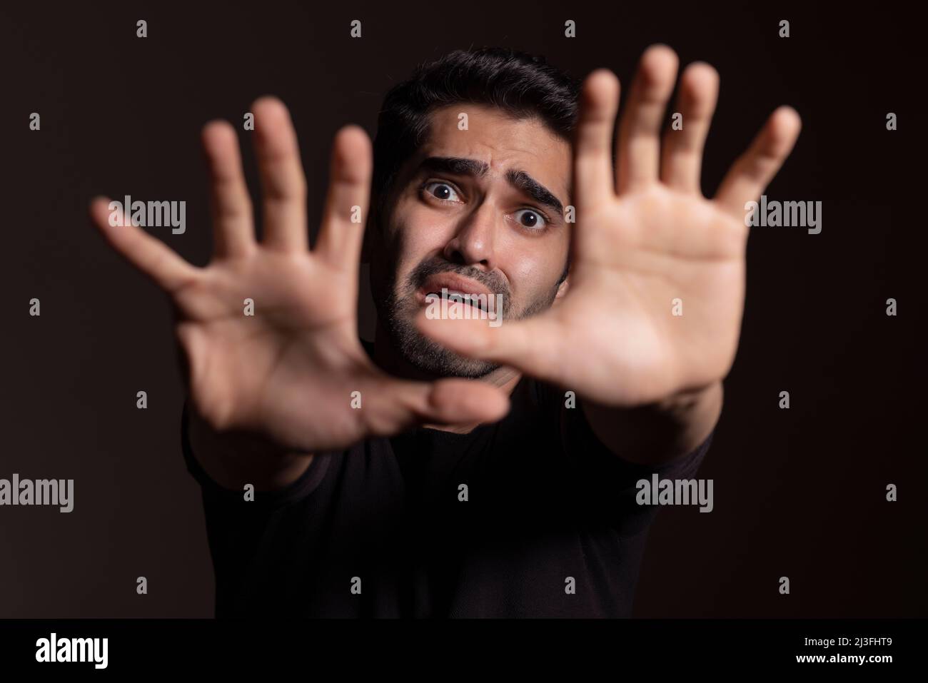 Man frightened crying hi-res stock photography and images - Alamy