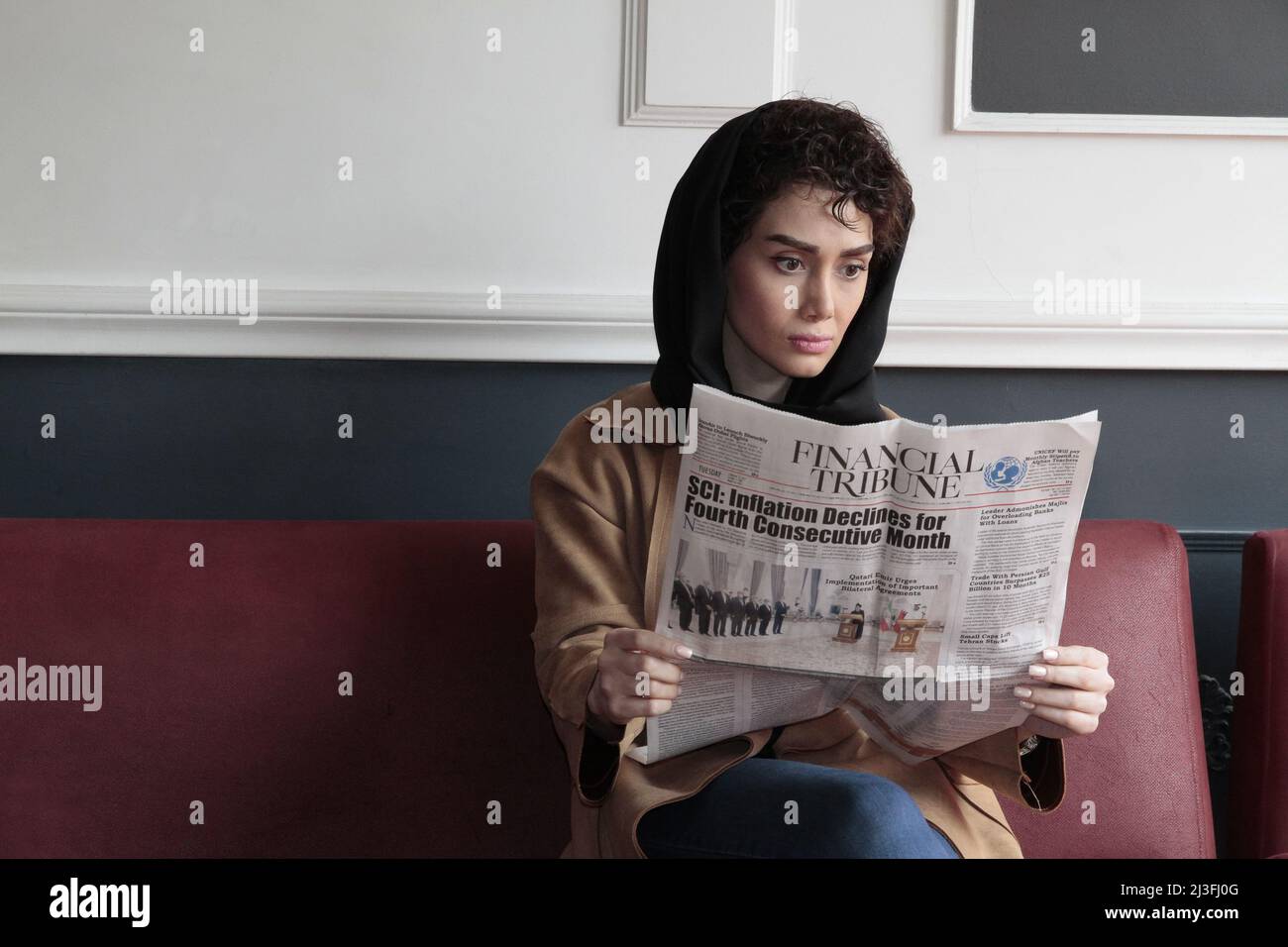 Female model in a cafe Stock Photo - Alamy