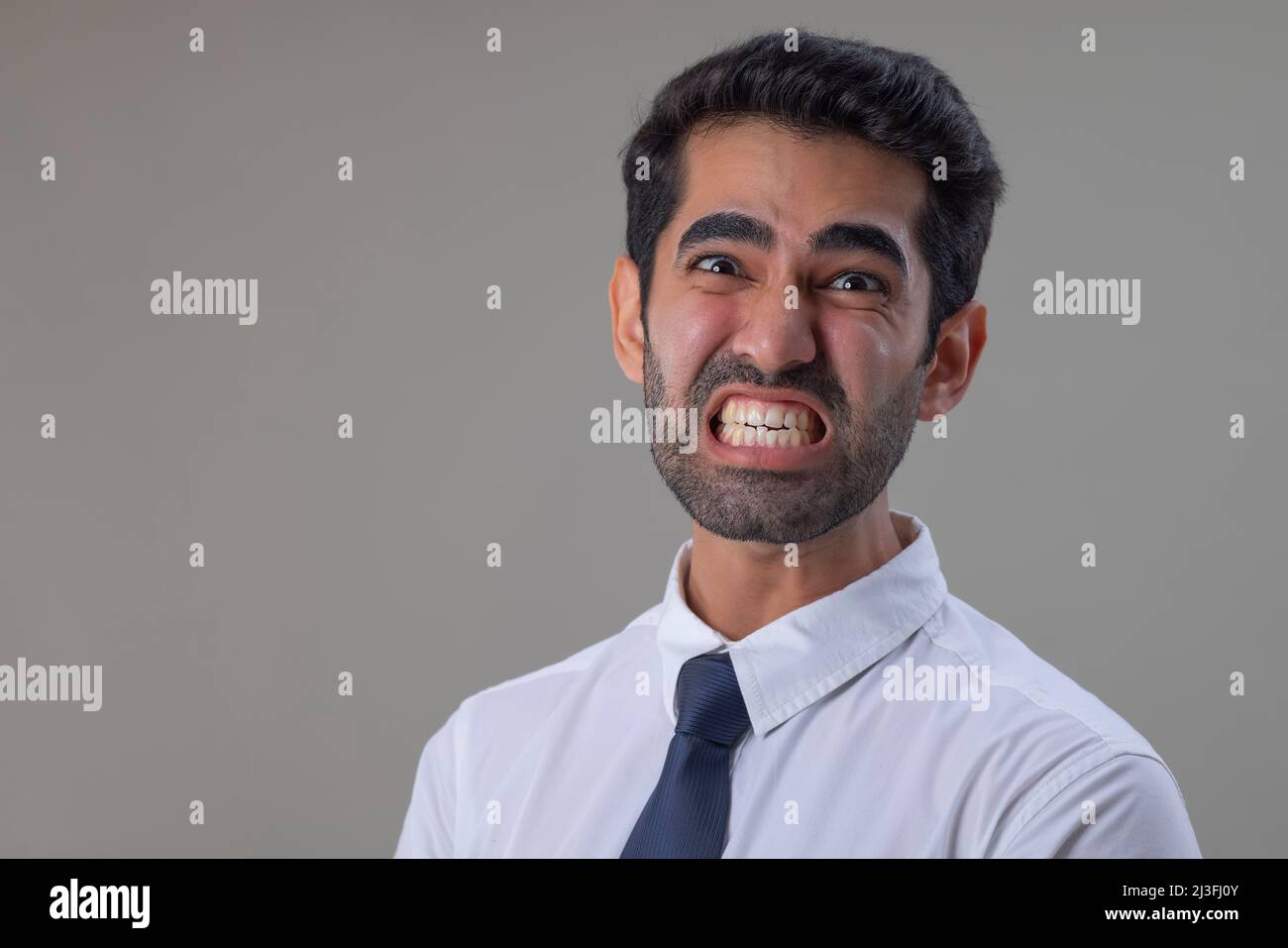Clenching teeth hi-res stock photography and images - Alamy