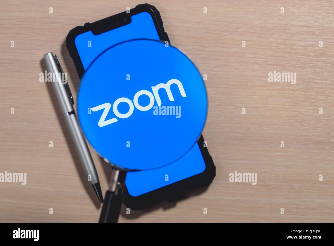 Zoom app logo on the screen smartphone closeup. Zoom Video ...