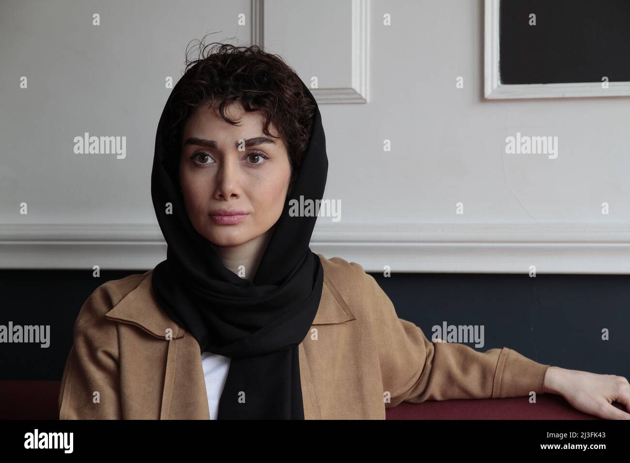 Female model in a cafe Stock Photo - Alamy