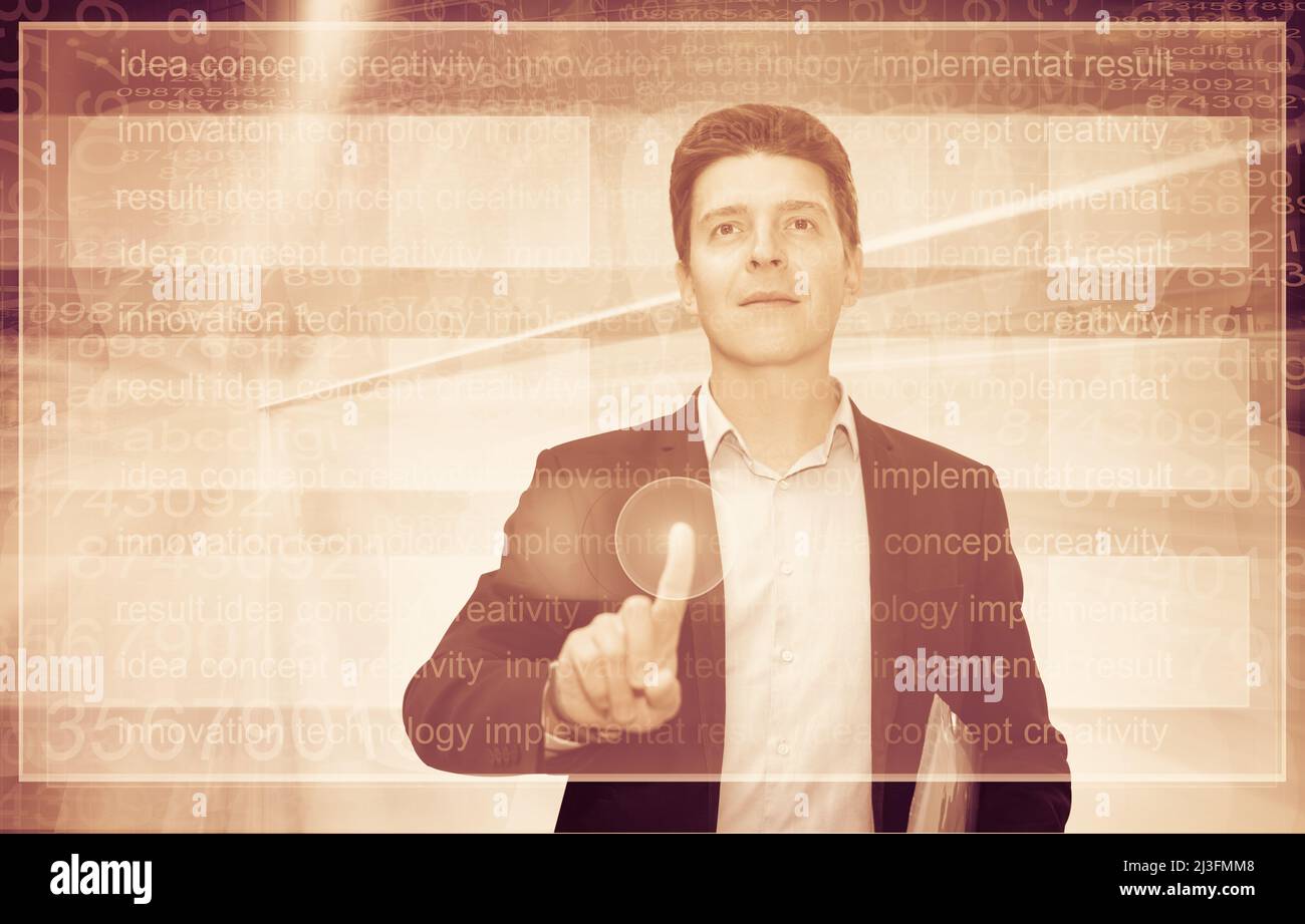 Man in suit touching screen Stock Photo - Alamy