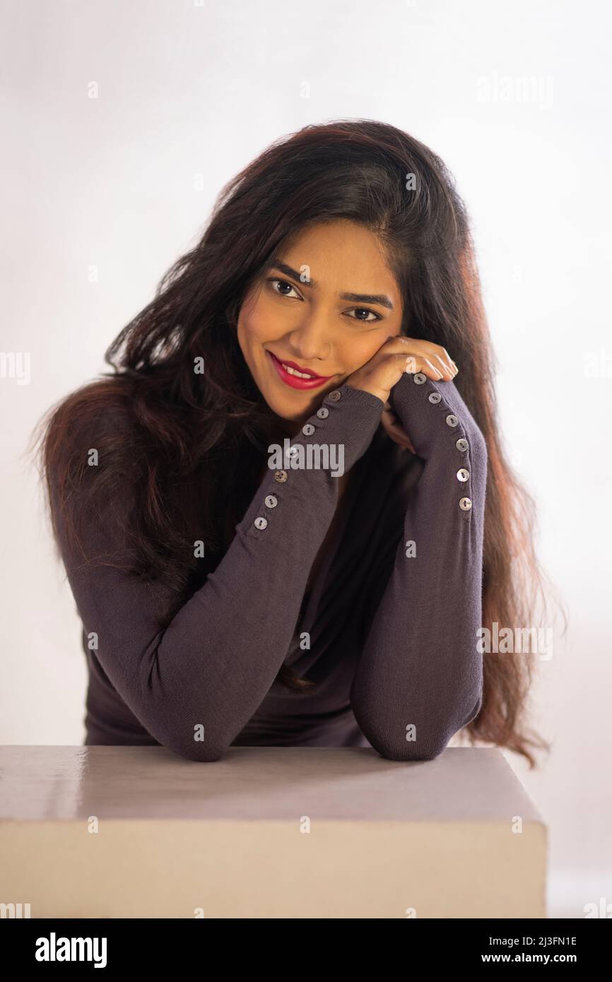 Resting chin on hands hi-res stock photography and images - Alamy