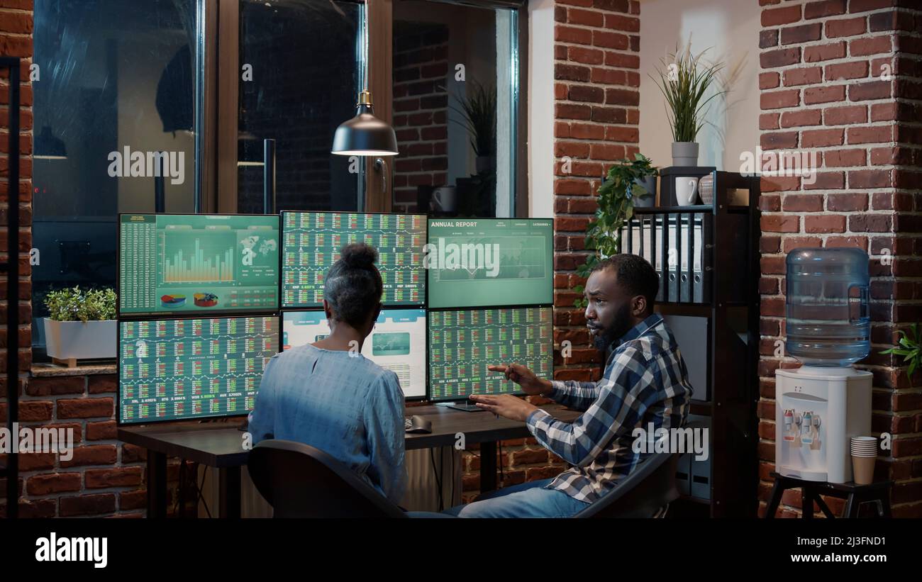 Capital sales market brokers working with real time stocks to analyze ...