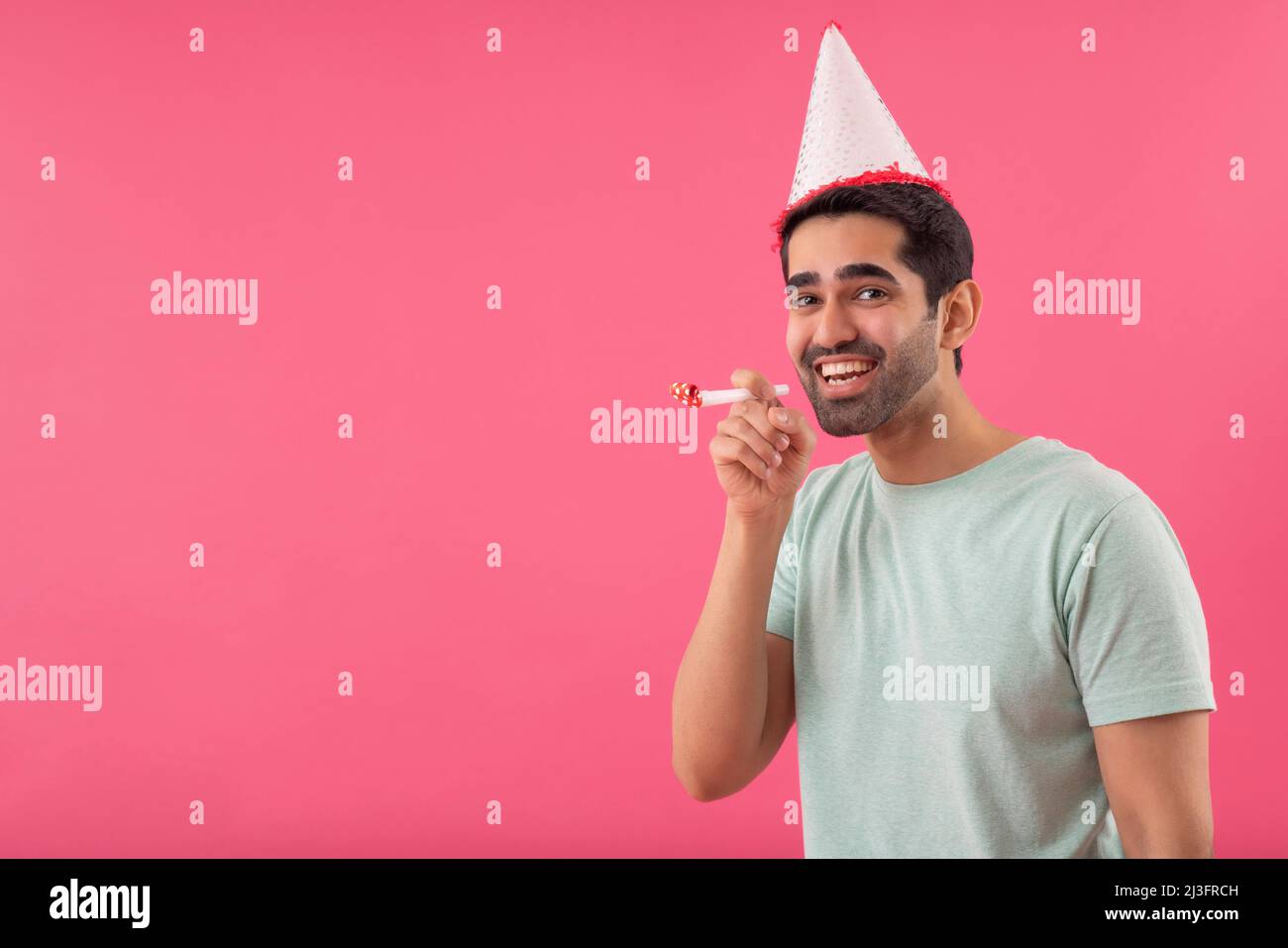 Man wearing party hat hi-res stock photography and images - Alamy