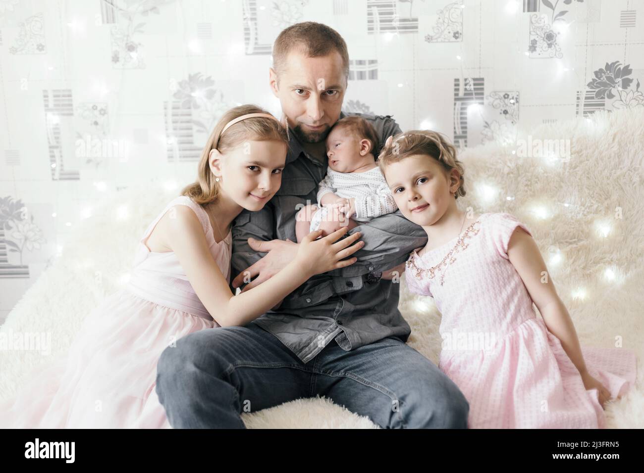 happy father with two daughters and a newborn son Stock Photo - Alamy