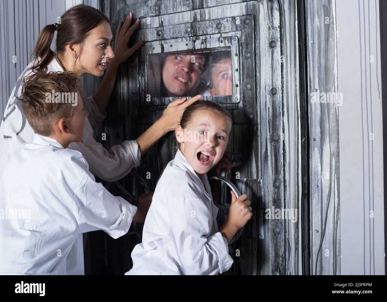 Family is saving each other from being locked up Stock Photo - Alamy