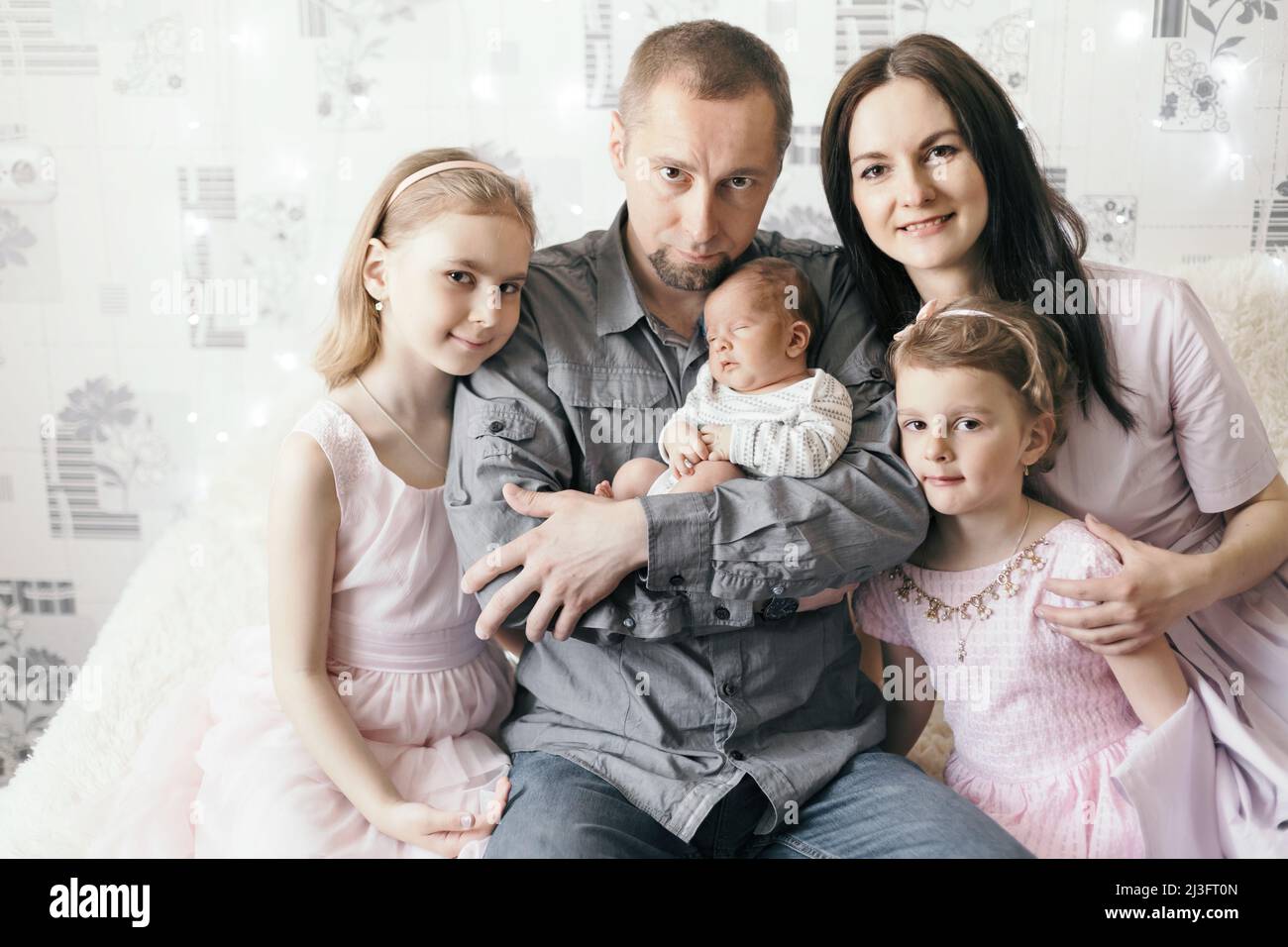happy father with two daughters and a newborn son Stock Photo - Alamy