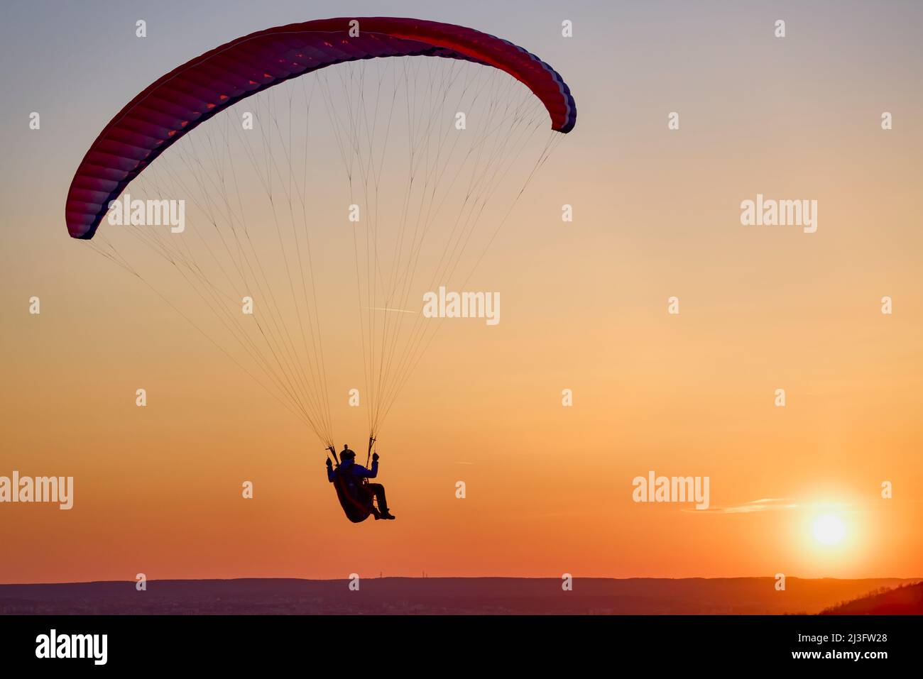 Valeni Arges Romania April 5, 2022: evening training of some skydiving ...