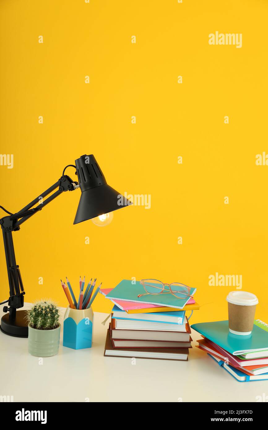 Concept of preparing to exams or tests on yellow background Stock Photo ...