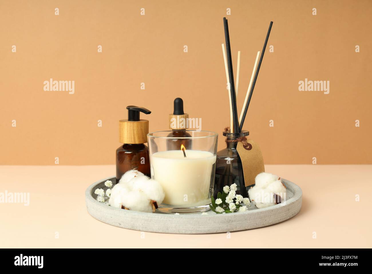 Concept of relaxation with burning aroma candle Stock Photo - Alamy