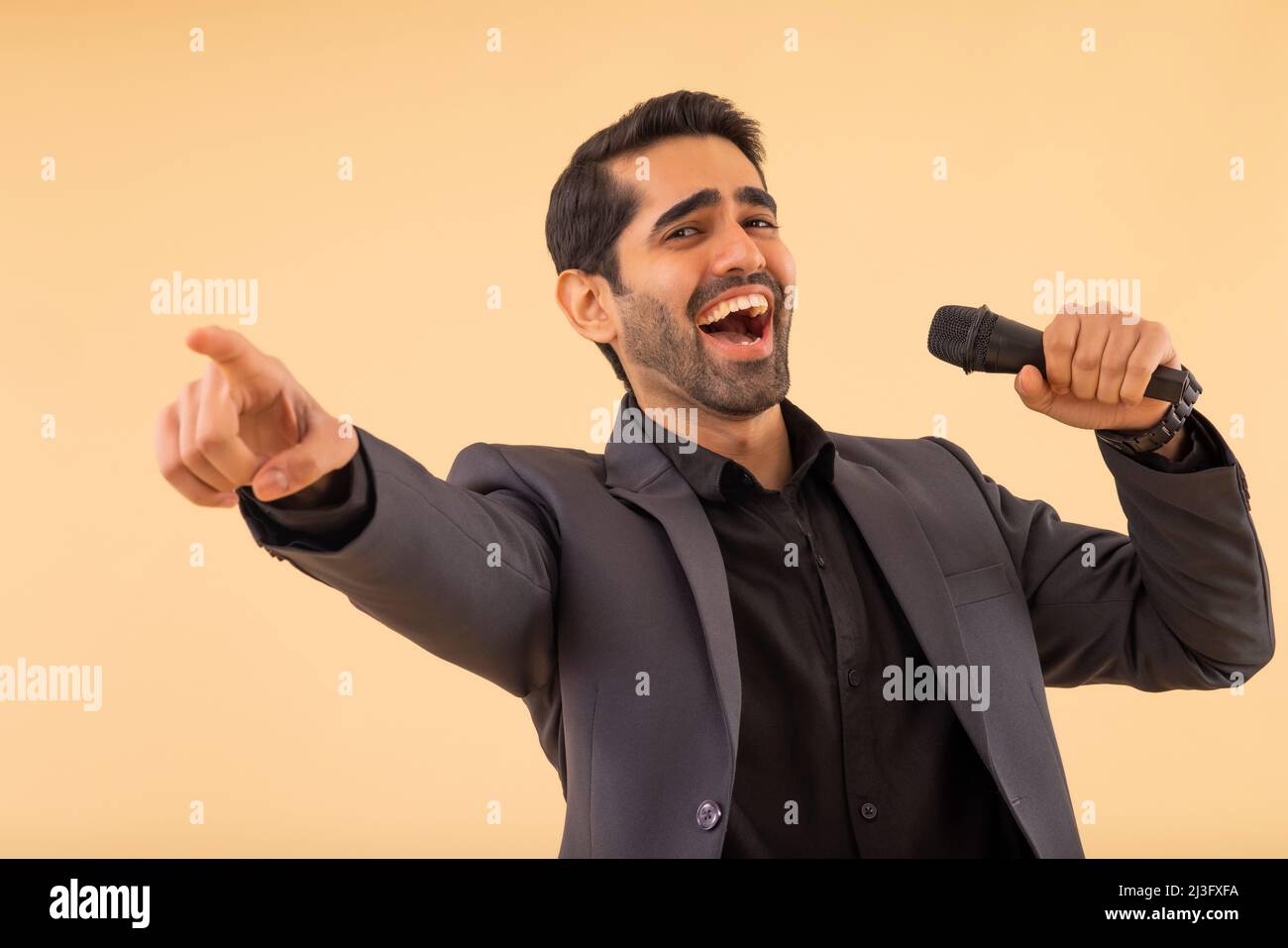 Businessman singing microphone hi-res stock photography and images - Alamy
