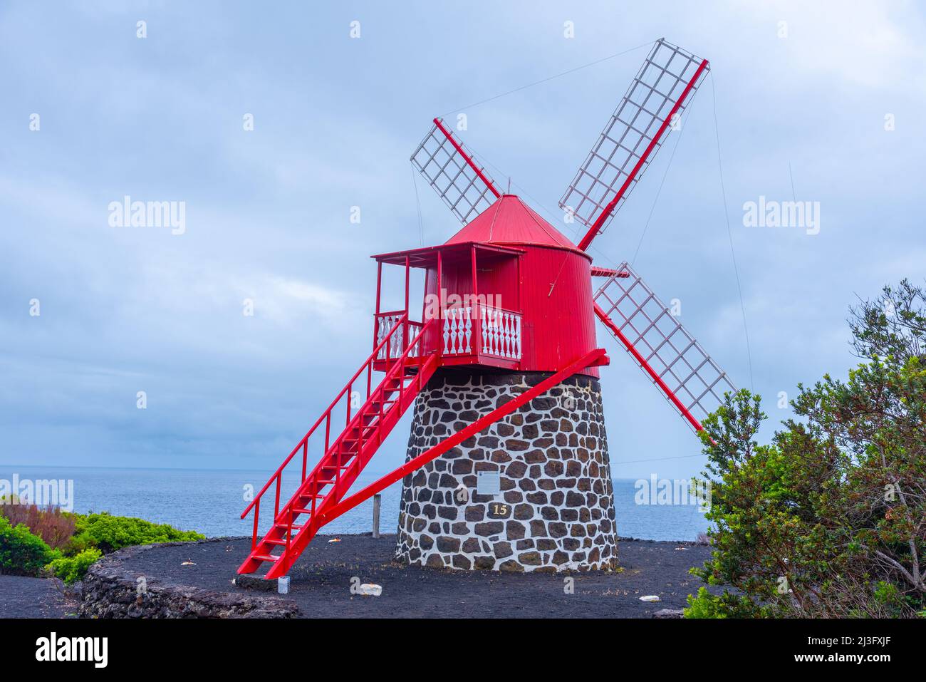 Wooden windmill at Pico island of the Azores, Portugal Stock Photo - Alamy