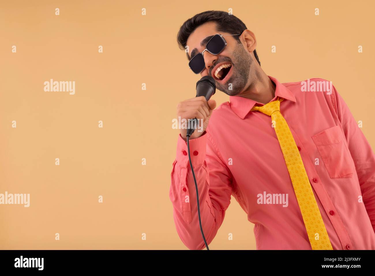 Indian man singing song hi-res stock photography and images - Alamy