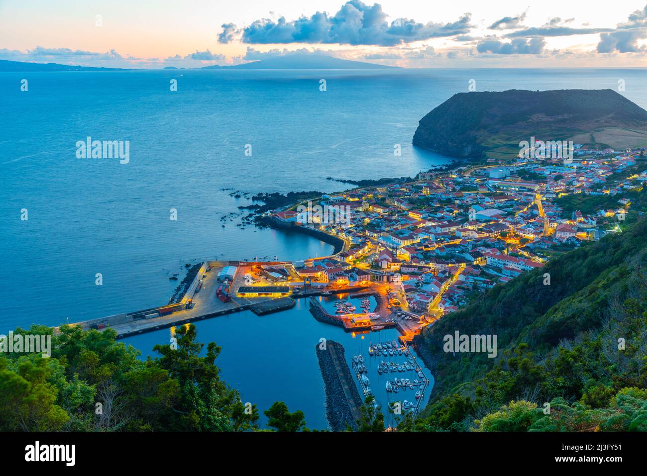 Sunset view of Velas town at Sao Jorge island in Portugal Stock Photo ...