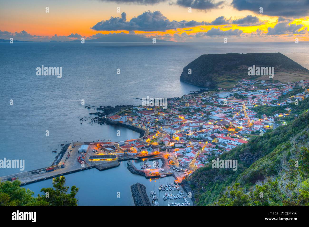 Sunset view of Velas town at Sao Jorge island in Portugal Stock Photo ...