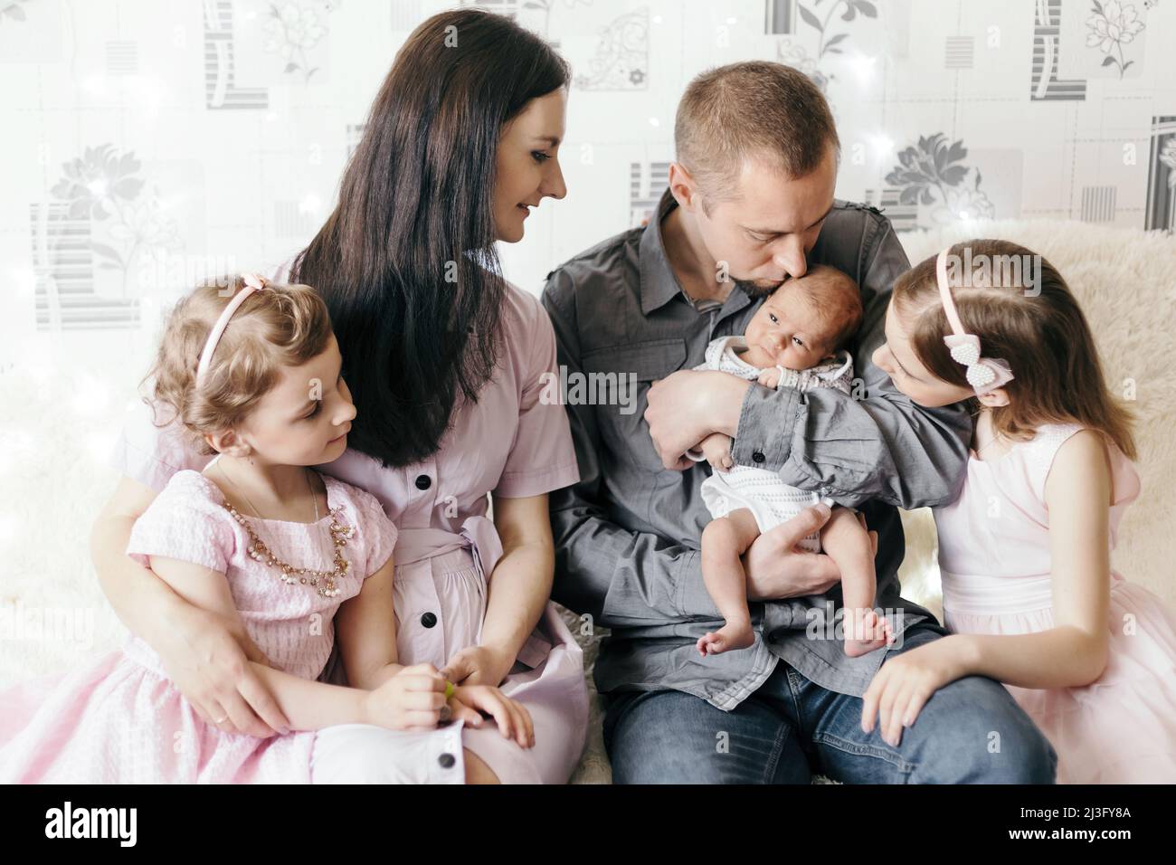 happy married couple with their three children Stock Photo - Alamy