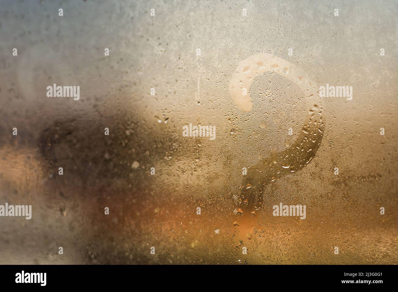Autumn rain, the inscription on the sweaty glass - question mark Stock ...