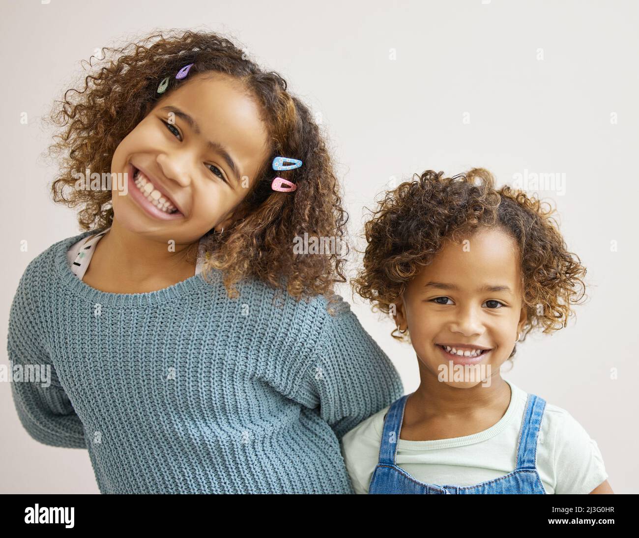 Growing up with confidence. Shot of two adorable little girls standing ...