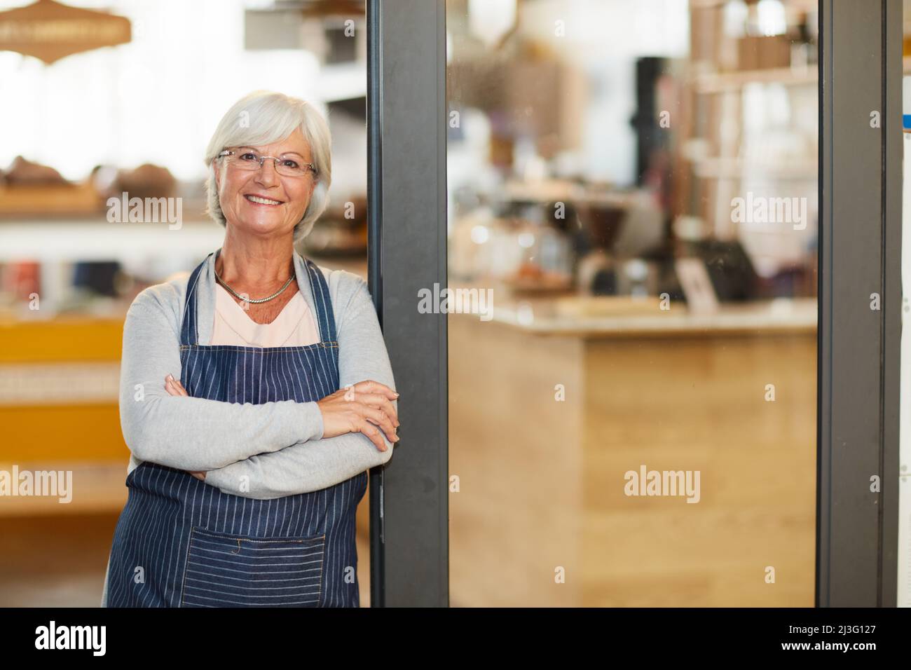 Welcoming Customers With A Smile Portrait Of A Happy Senior Business