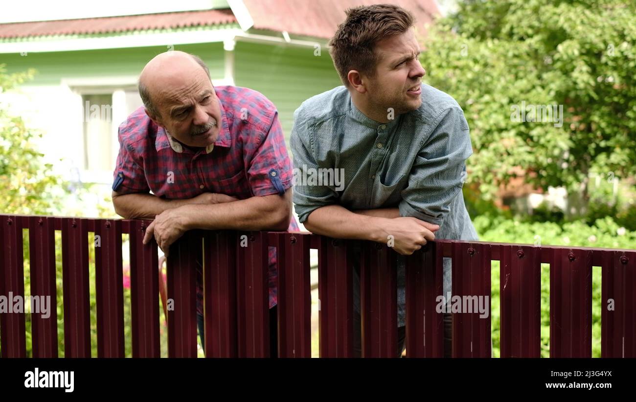 Peeping at neighbors hi-res stock photography and images - Alamy