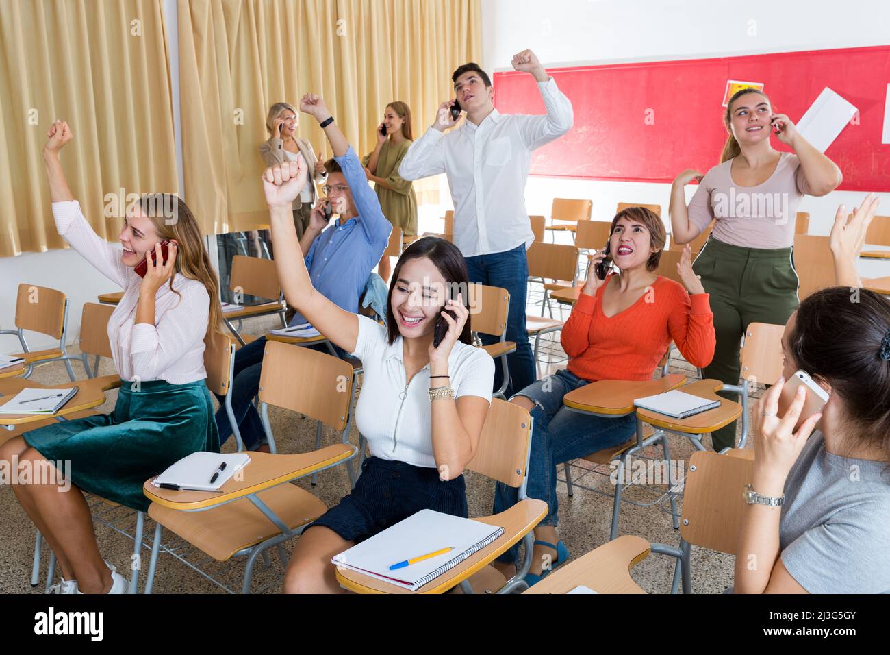 Group of young men on phones hi-res stock photography and images - Alamy