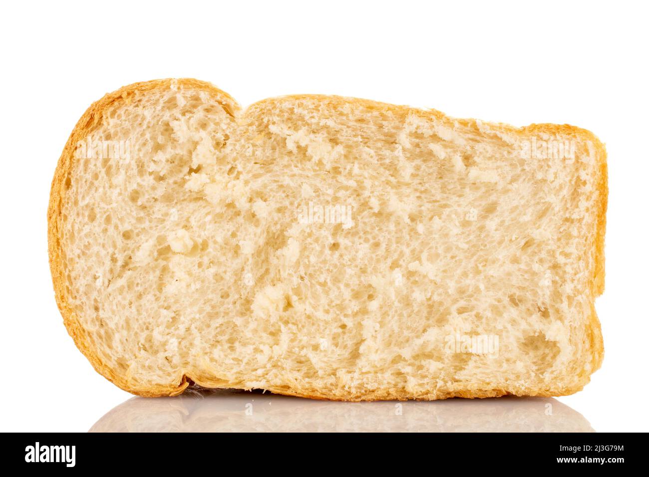 One half of a loaf of fresh fragrant white wheat bread, macro, isolated ...