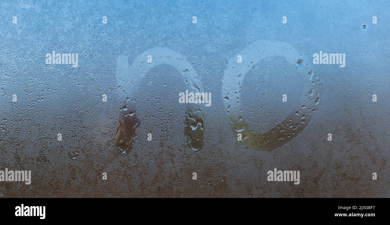 the word no handwritten on night wet window glass surface Stock Photo ...
