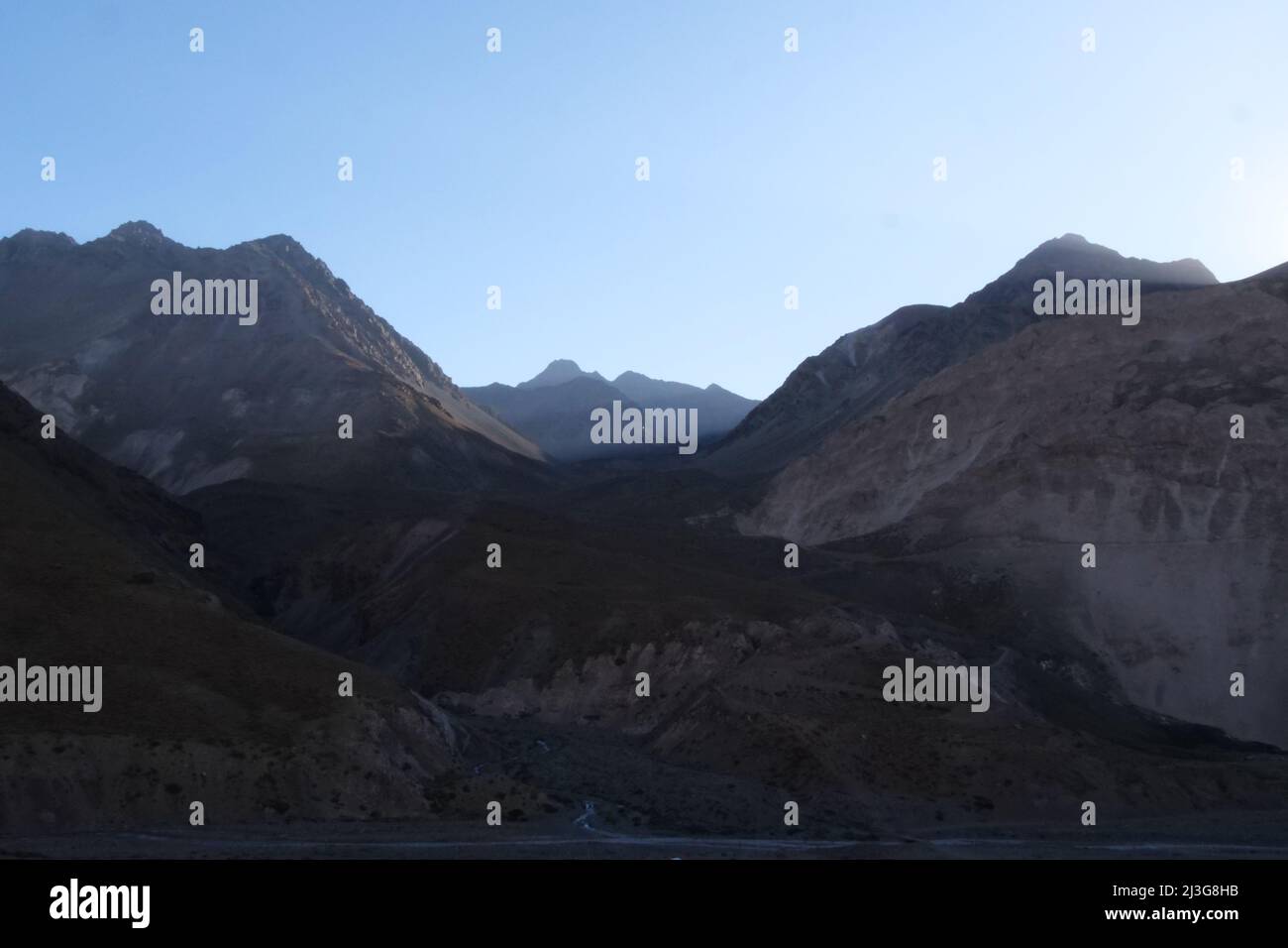 Grey mountain peaks at Valle de Colina, Cajón del Maipo at San Miguel ...