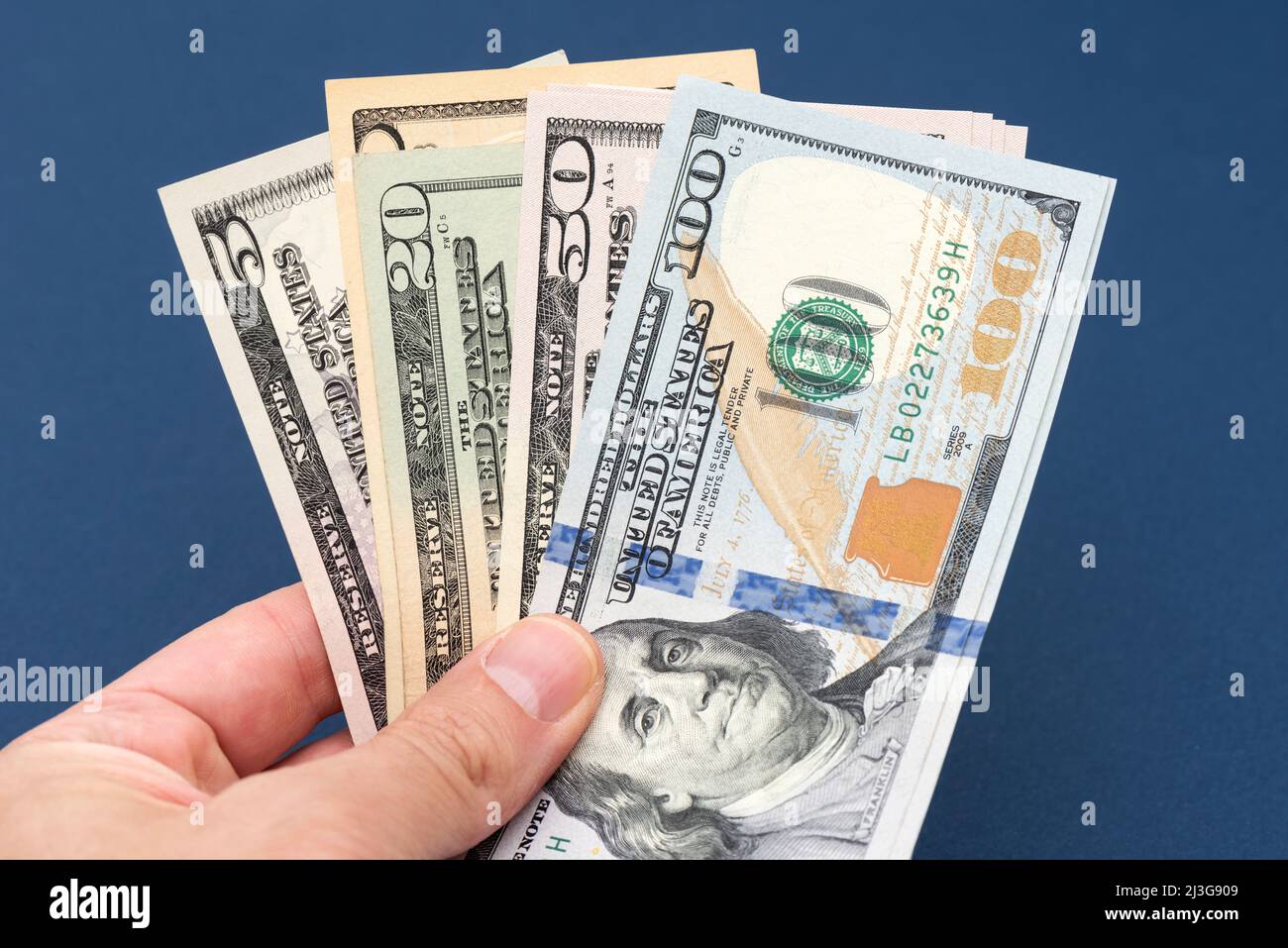 American dollars. A stack of hundred dollar bills. Close up of new ...