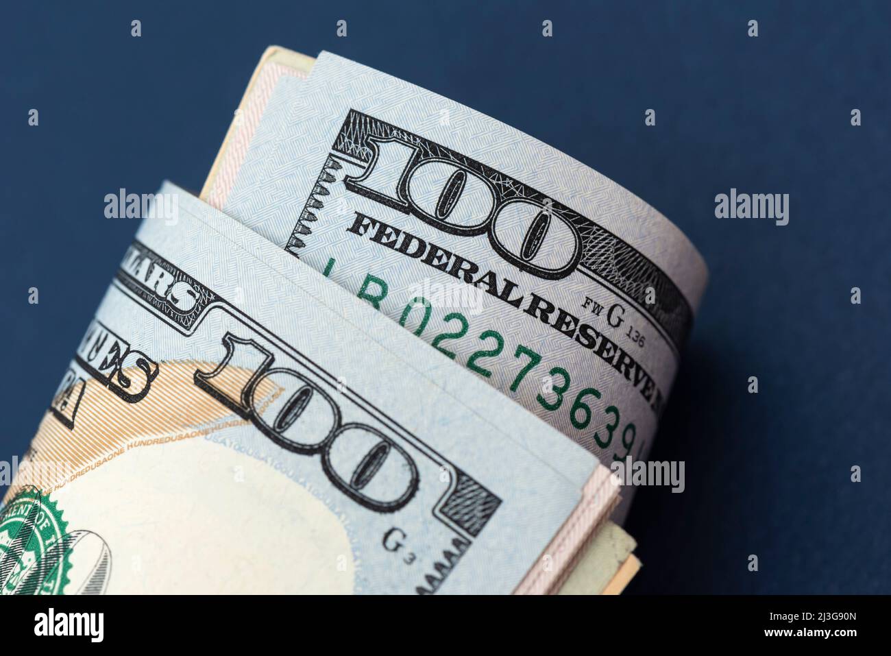 American dollars. A stack of hundred dollar bills. Close up of new ...
