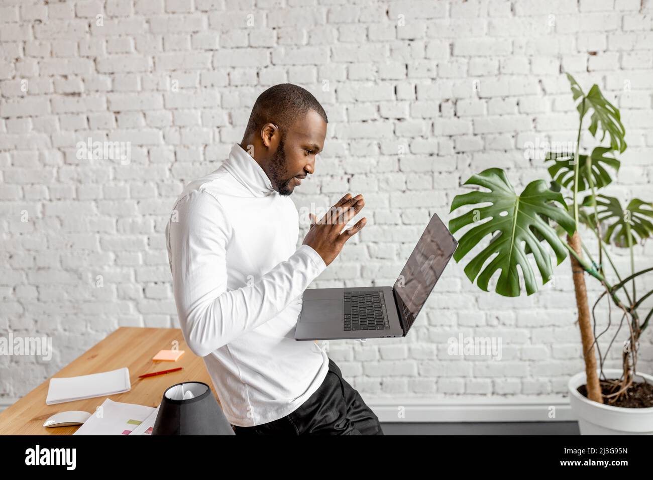 African american male freelancer or student recording voice message to ...