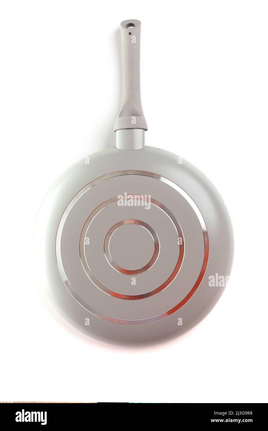lower part of a modern gray frying pan on a white background Stock ...
