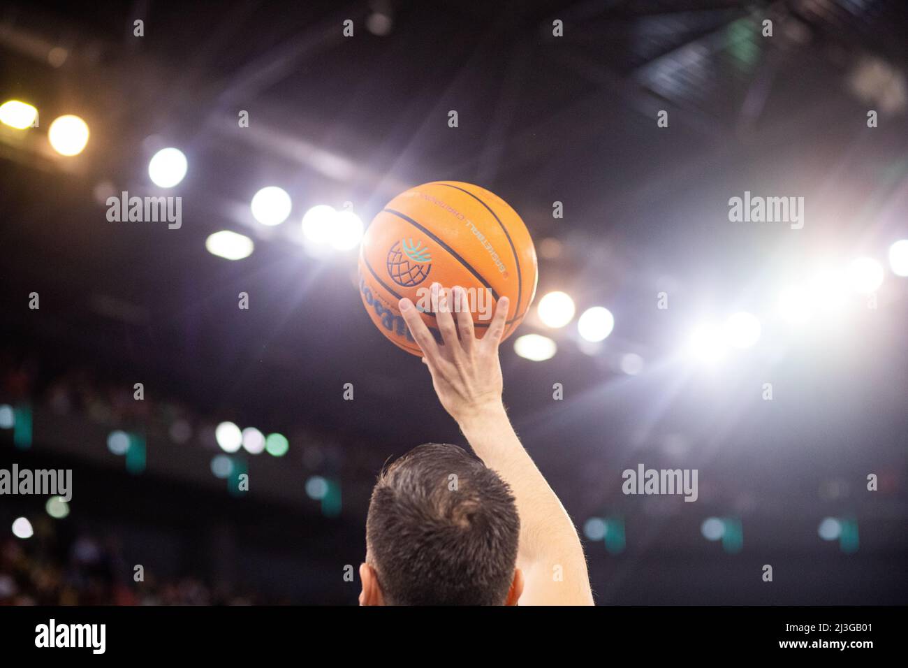 referee holding Champions League basketball during game Stock Photo - Alamy