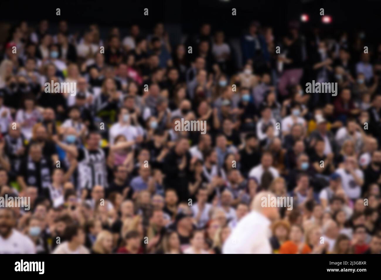 blurred background of supporters at sports event crowd of people in a ...