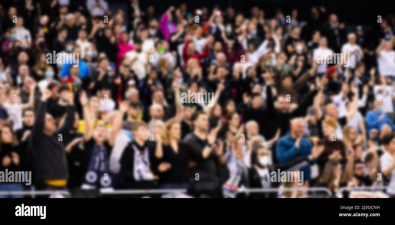 blurred background of supporters at sports event crowd of people in a ...