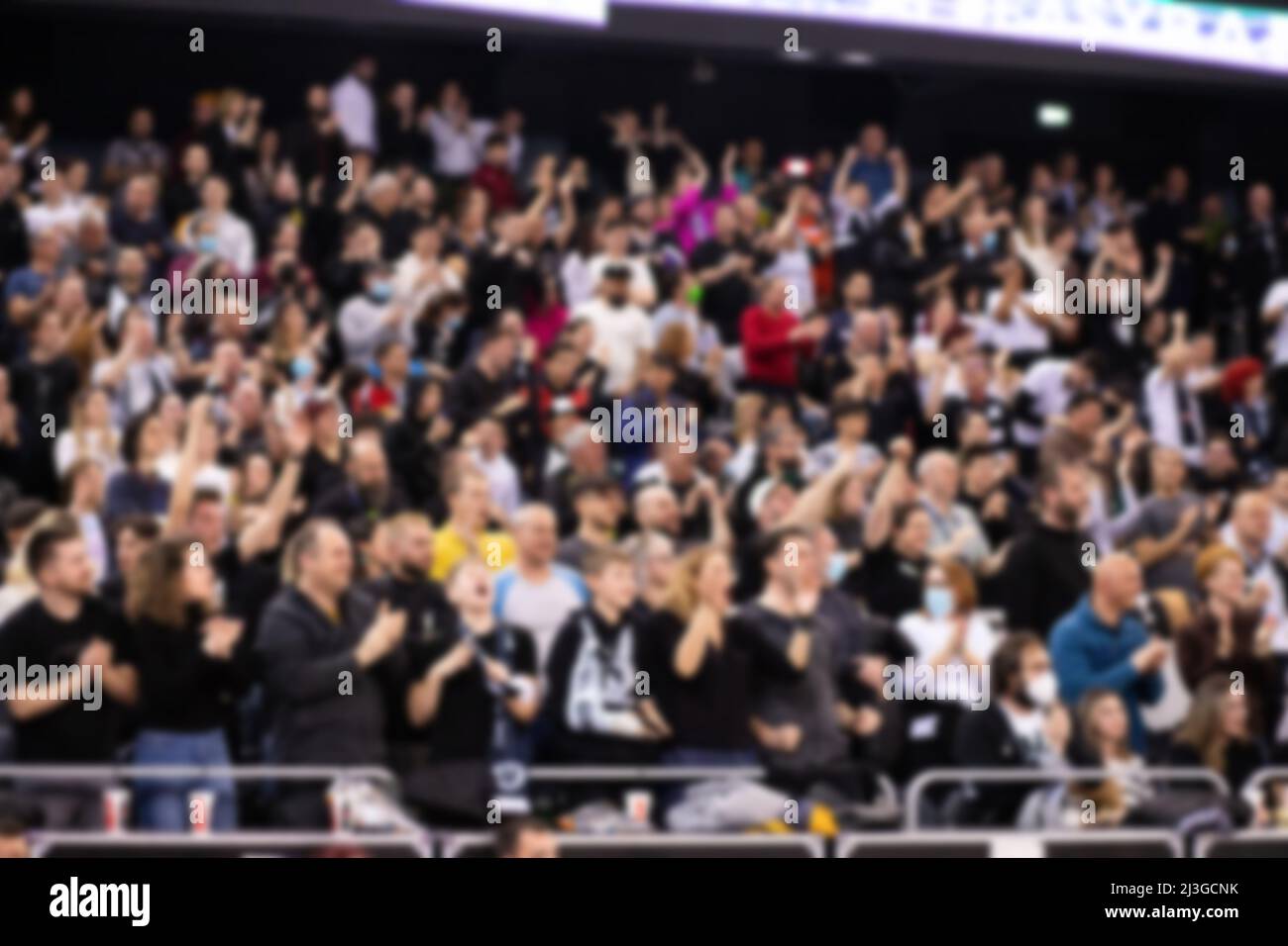 blurred background of supporters at sports event crowd of people in a ...
