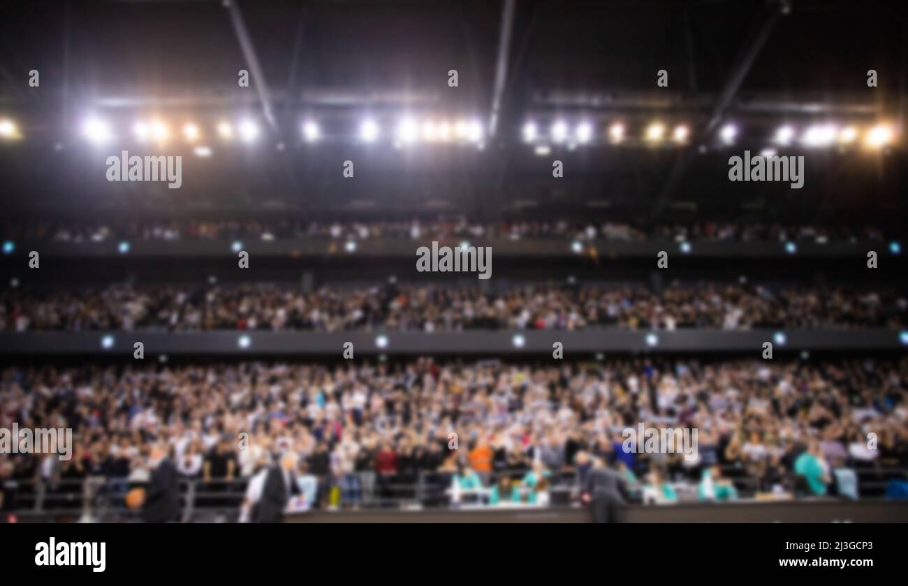blurred background of supporters at sports event crowd of people in a ...