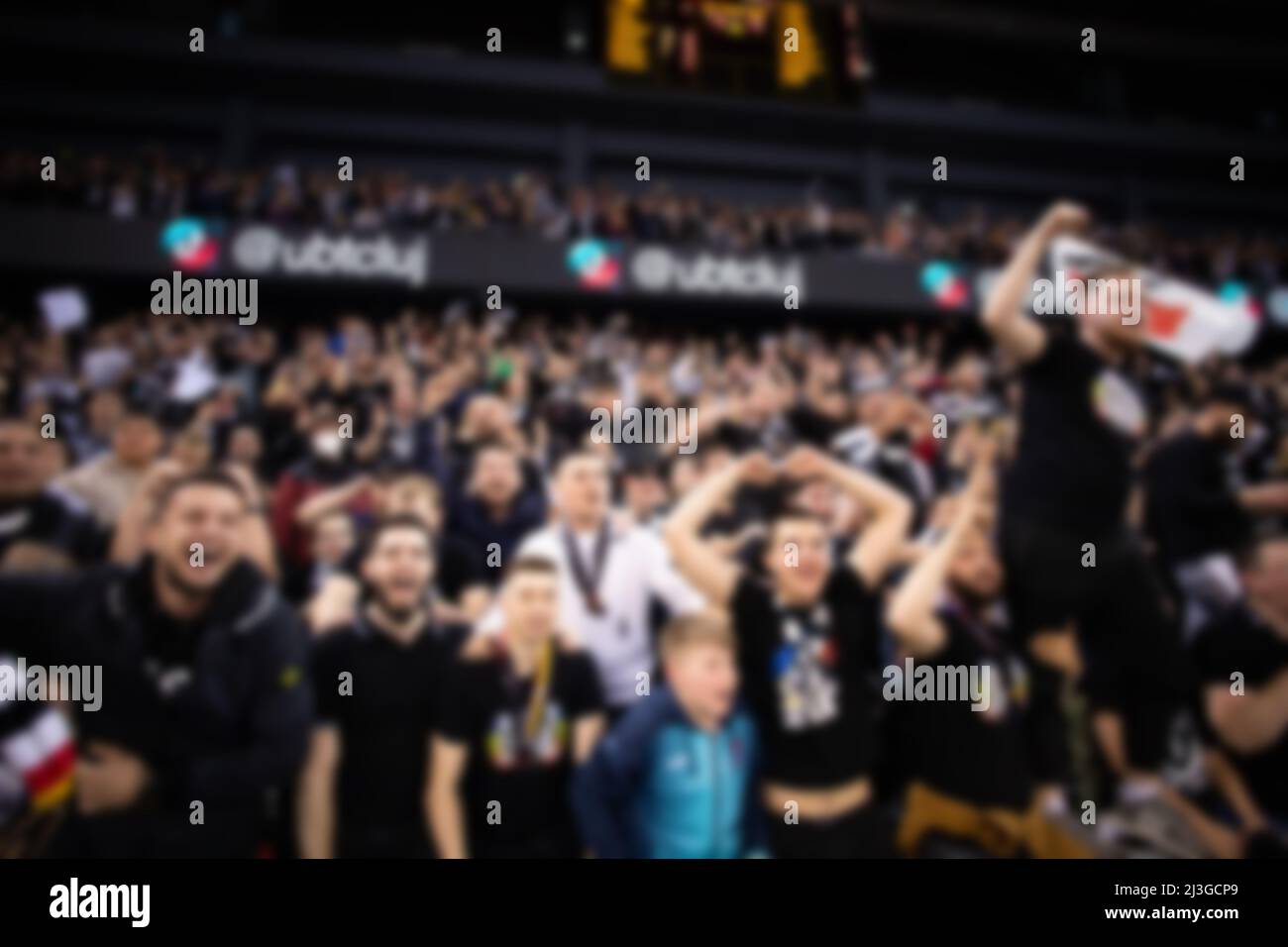 blurred background of supporters at sports event crowd of people in a ...