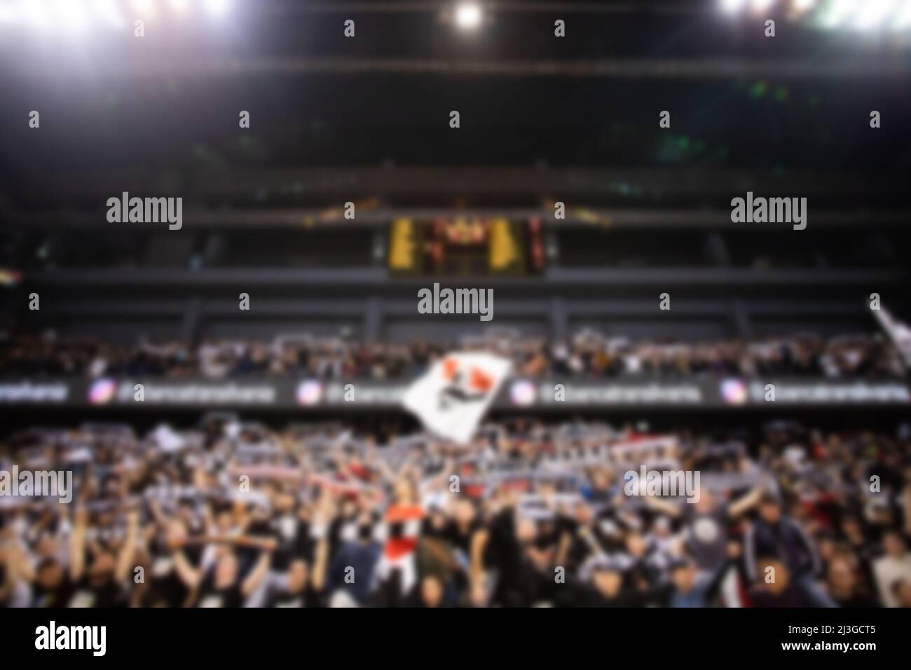 blurred background of supporters at sports event crowd of people in a ...