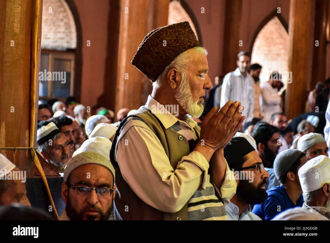 A Kashmiri Muslim prays inside the Grand Mosque (Jamia Masjid) during ...